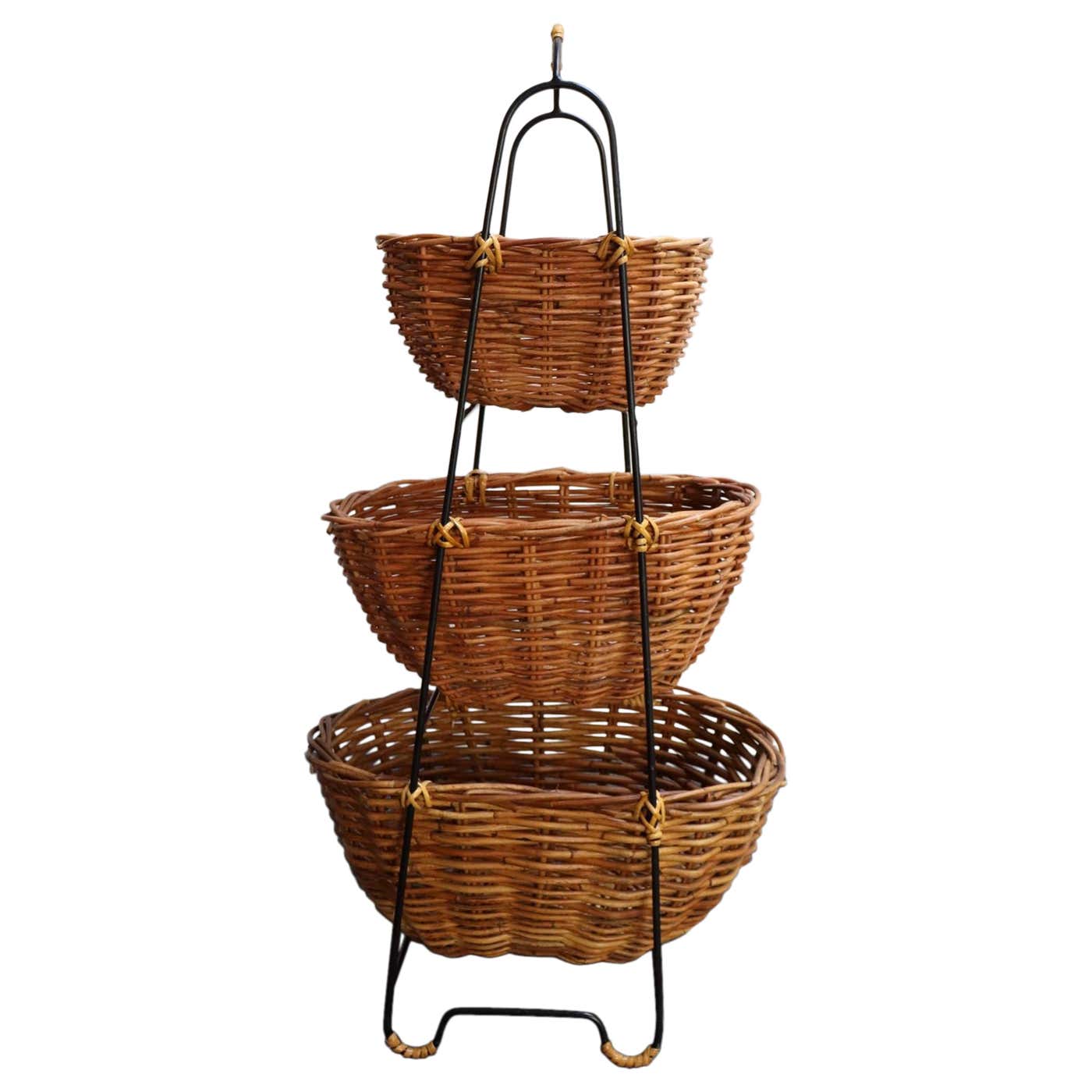 Vintage Graduated Wicker And Iron Three Tiered Basket Stand For Sale At vintage-graduated-wicker-and-iron-three-tiered-basket-stand-for-sale-at