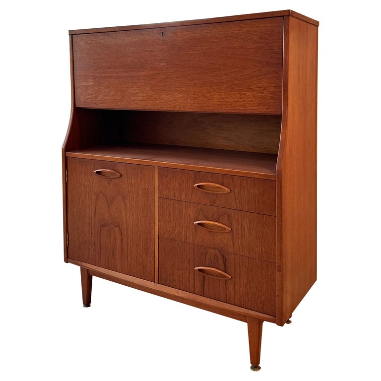 A mid century modern cabinet with a drop front desk by Jentique furniture For Sale at 1stDibs