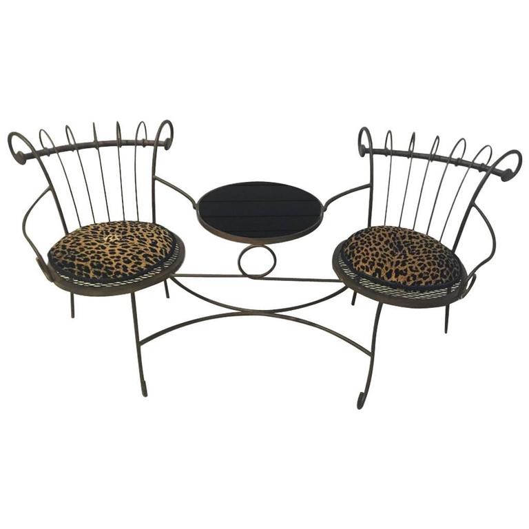 Tea Table with Two Chairs Having Leopard Print Cushions and Marble Top ...