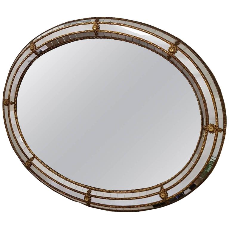 Brass Adams Style Oval Mirror For Sale at 1stDibs