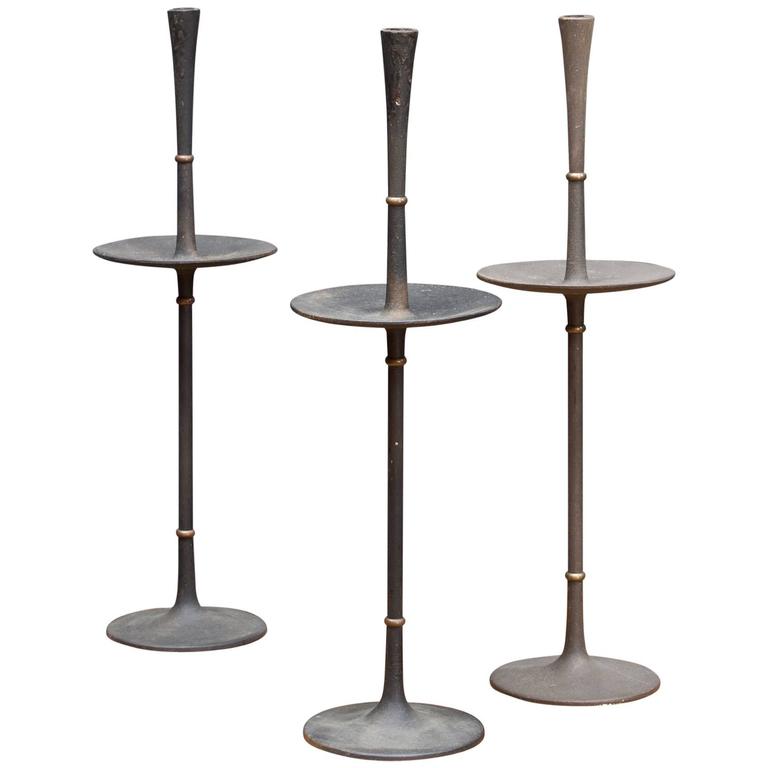 Early Quistgaard Cast Iron and Brass Candlesticks at 1stDibs