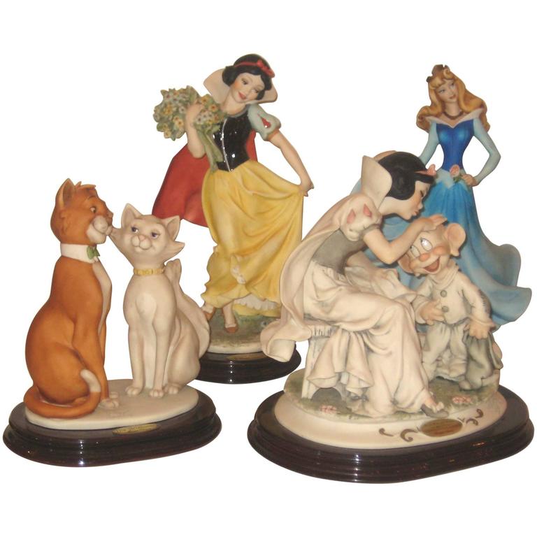 Collection of Four Giuseppe Armani Disney Character Figurines at 1stDibs