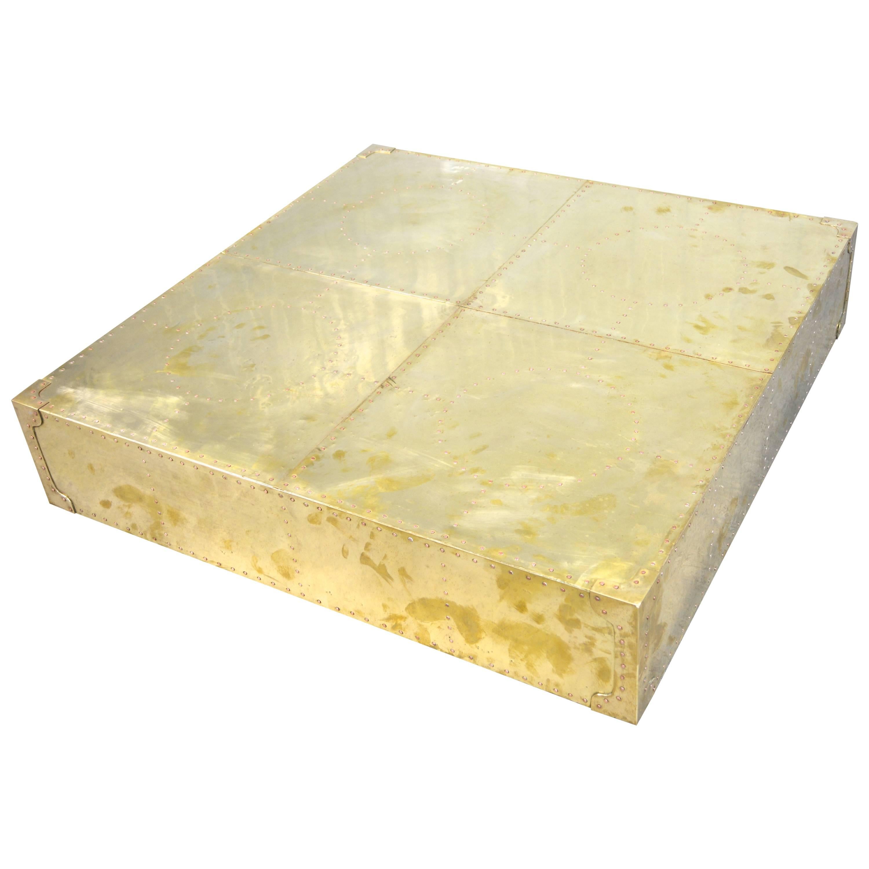 Sarreid Studded Brass Coffee Table on Plinth Base at 1stDibs