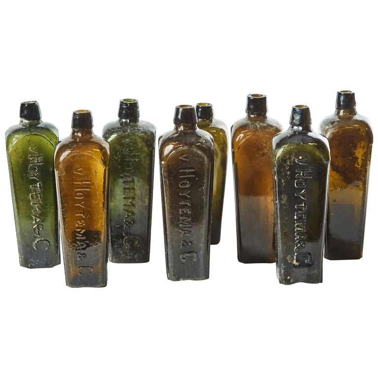 Set of 8 Multi-Color Gin Glass Bottles from Mid-Century Germany at 1stDibs