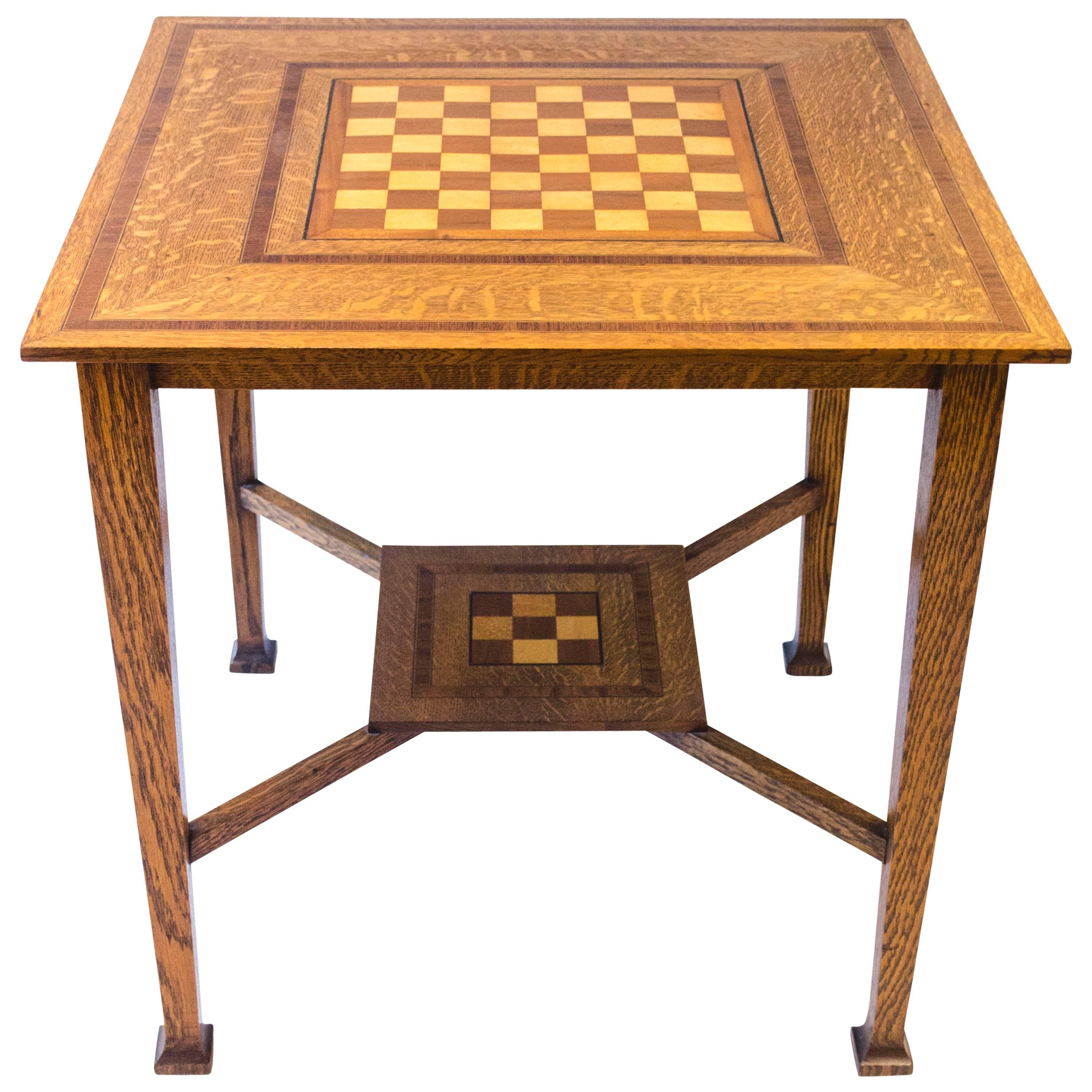 Liberty and Co attributed, An Arts and Crafts Oak Chess Table at ...