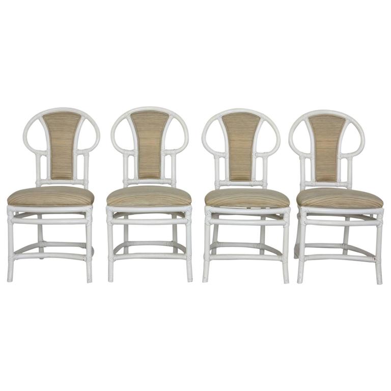 Four Vintage Rattan Dining Chairs Painted White For Sale at 1stDibs