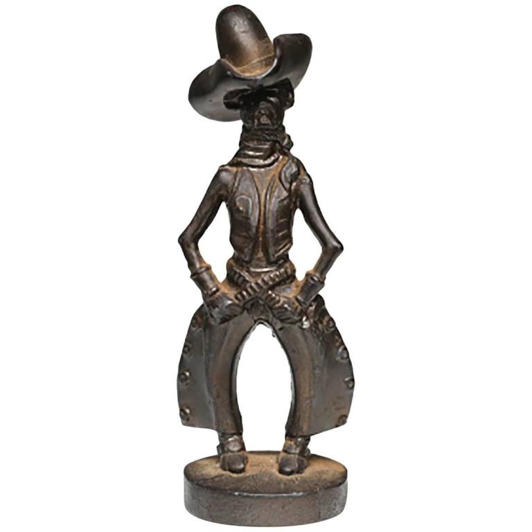 Charming Bow-Legged Bronze Cowboy with a Ten Gallon Hat For Sale at 1stdibs