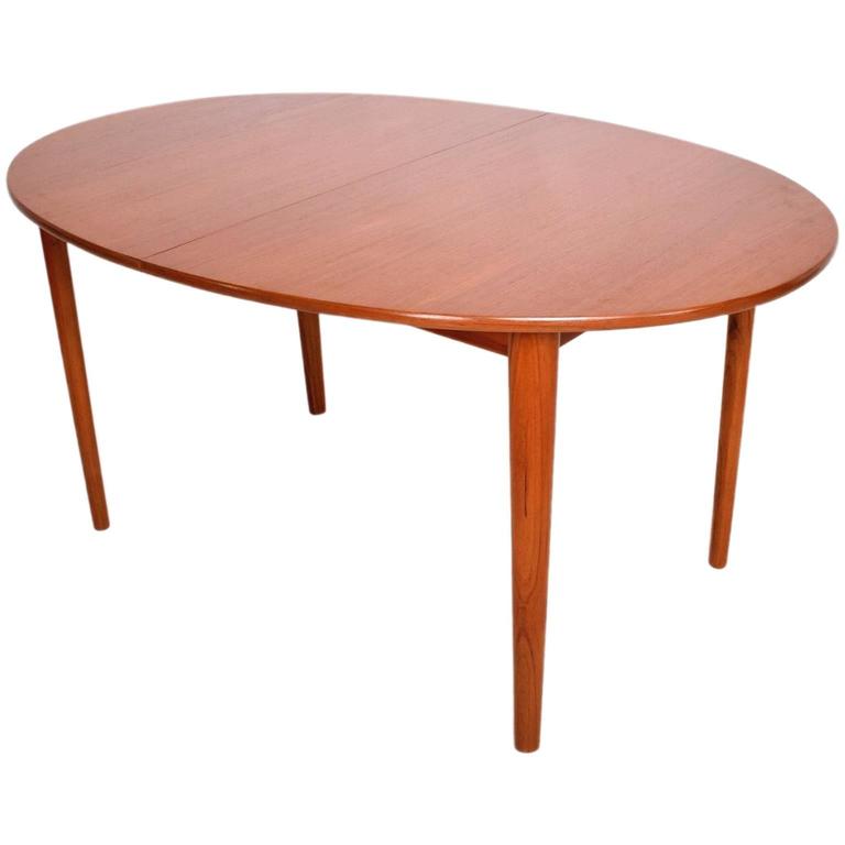 Danish Modern Teak Dining Table Oval Shape with Extensions at 1stDibs