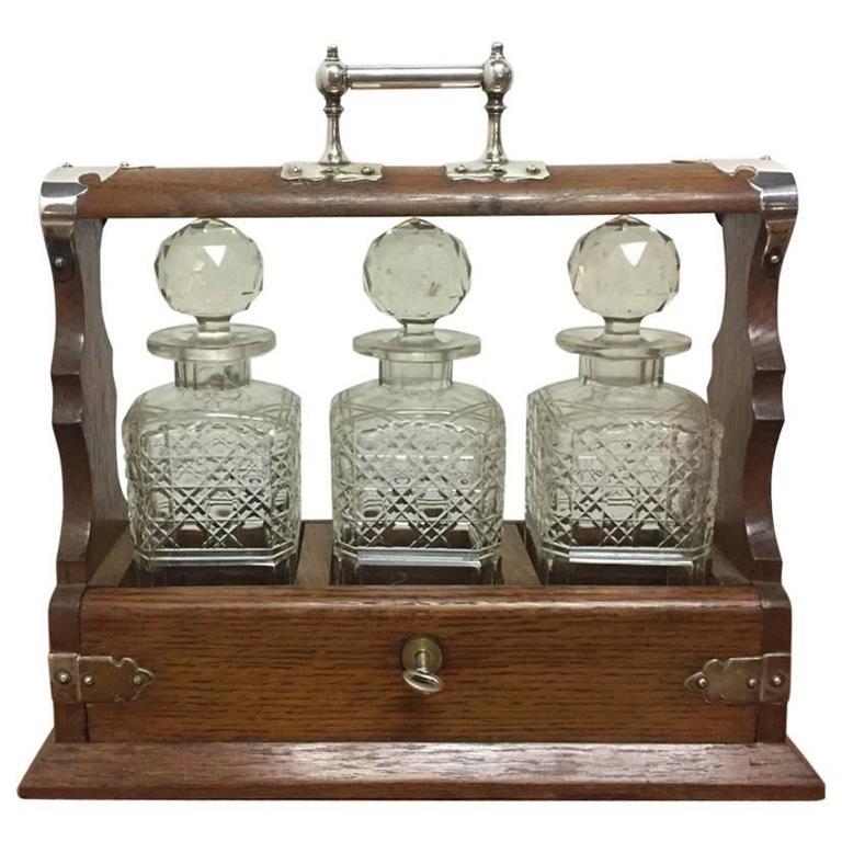Late Victorian Gothic and Aesthetic Oak Triple Decanter Set at 1stDibs