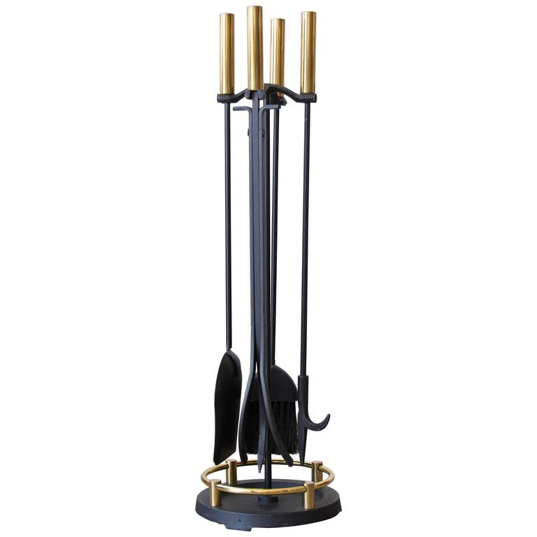 Pilgrim Four-Piece Fireplace Set with Brass Details at 1stDibs