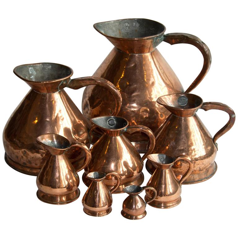 Set of Eight Antique Graduated English Haystack Copper Jugs at 1stDibs