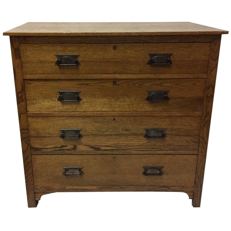 Harris Lebus Arts and Crafts Oak Chest of Drawers with Floral Detailed ...