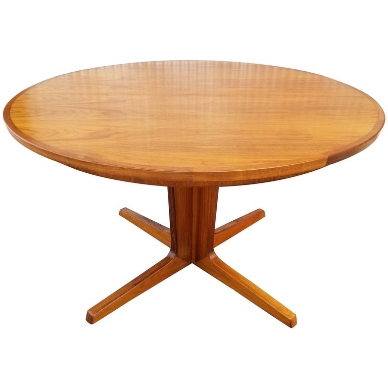 Round Teak Dining Table with Two Leaves at 1stDibs
