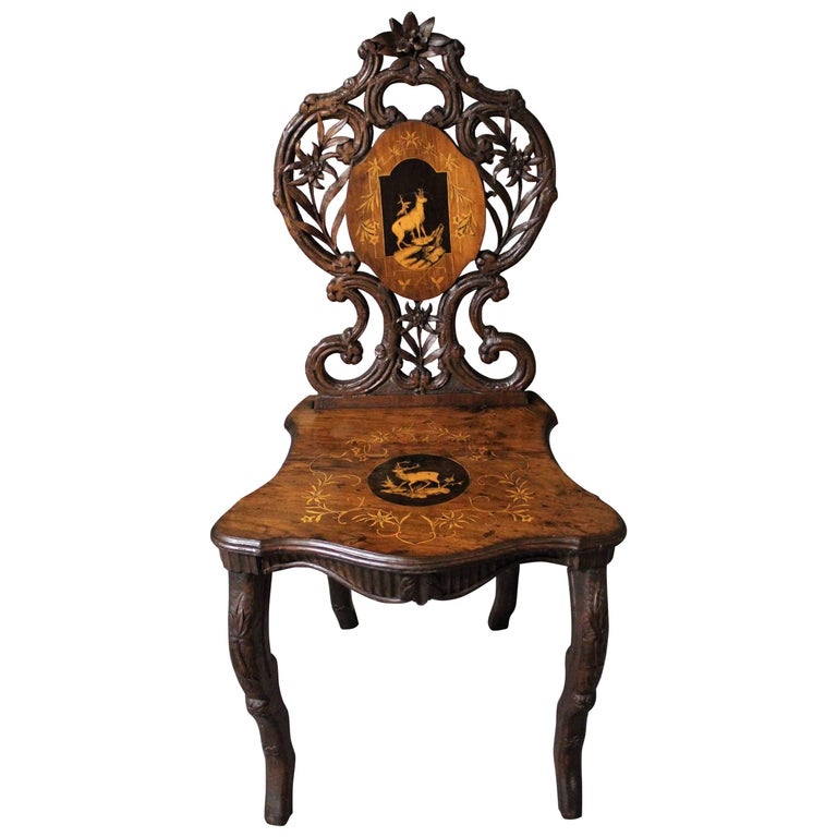 19th Century Black Forest Carved Chair with Inlay at 1stDibs
