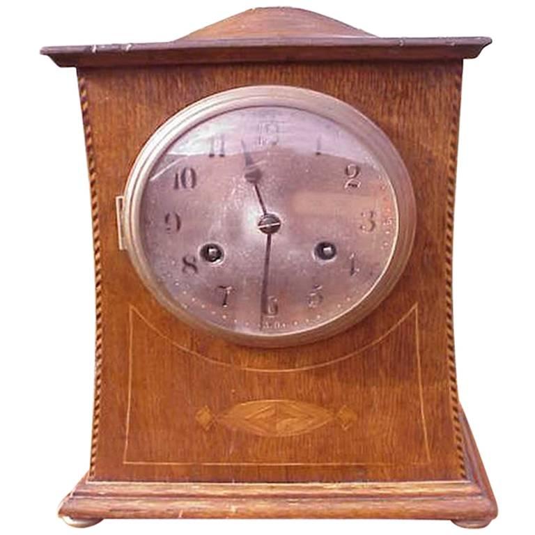 Liberty and Co Attributed. An Arts and Crafts Oak Mantle Clock with ...