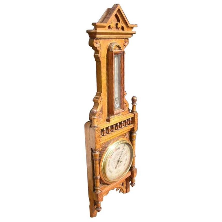 A Large Gothic Revival Carved Oak Barometer with a Rare Snail Tail ...