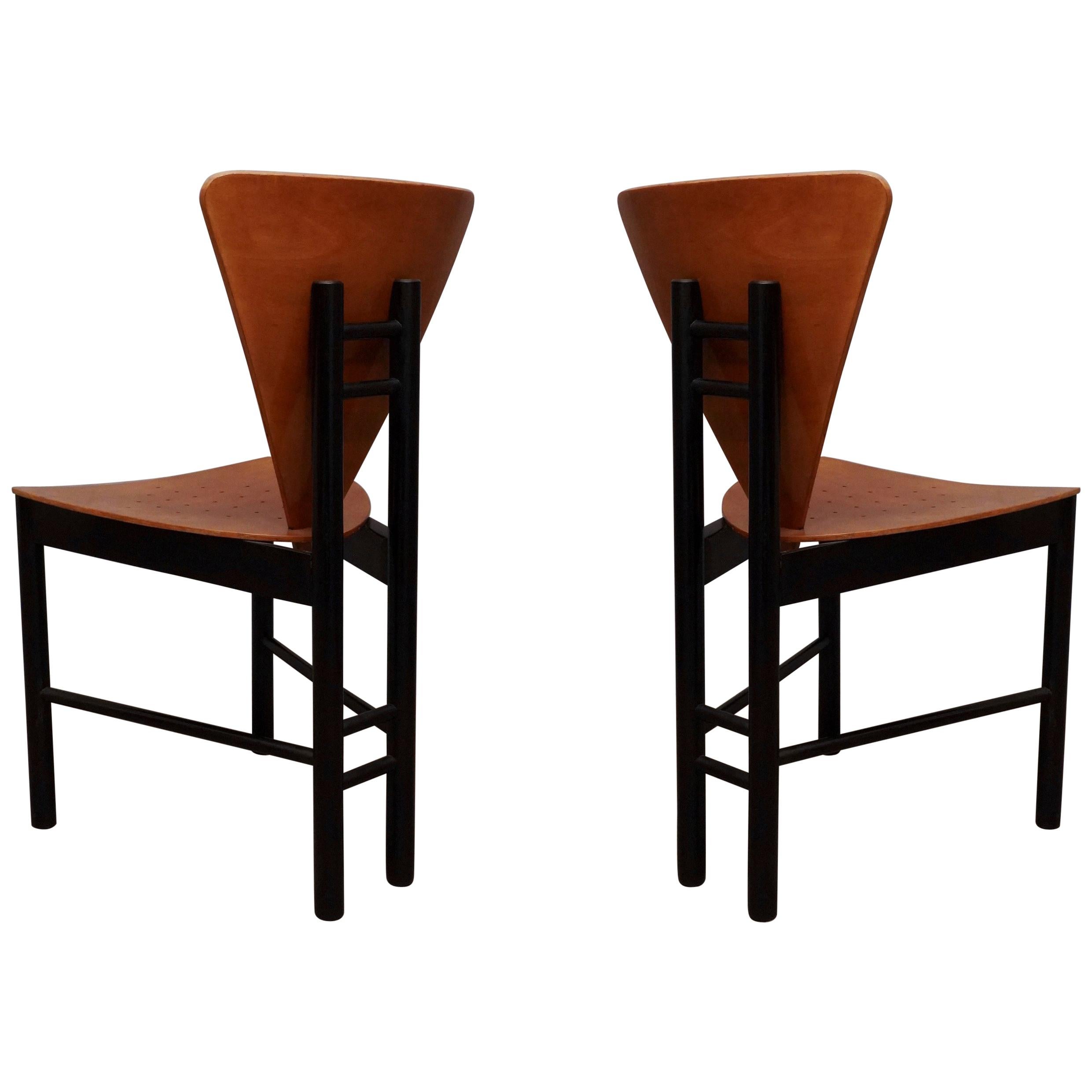 Pair of wood tri-leg triangular side chairs with upholstered seats at ...