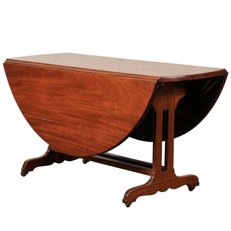 Late 19th Century Drop-Leaf Table, Trestle Form Base with Casters For ...