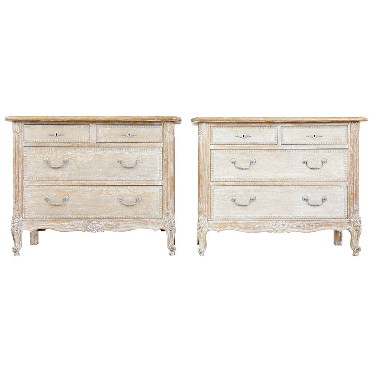 Pair of 19th century French carved limed oak commodes at 1stDibs