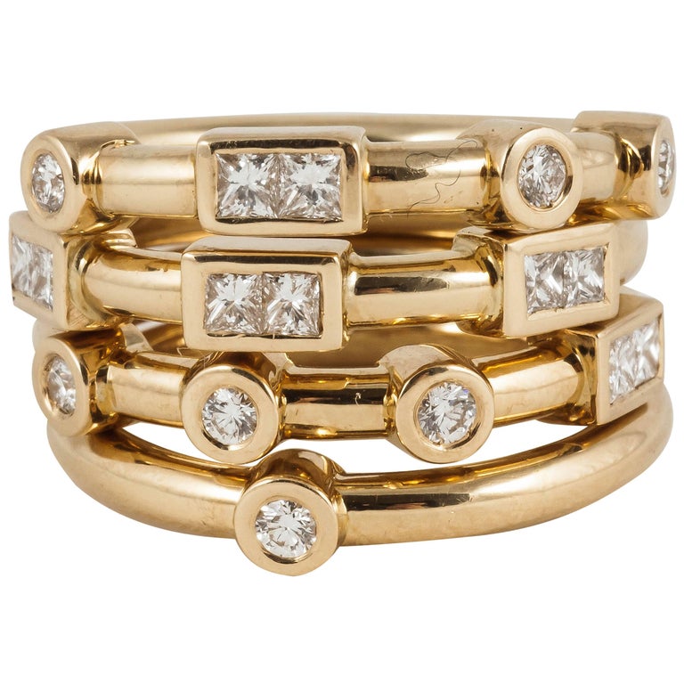 18k Yellow Gold and White Diamond Love Stacking Rings spelling "LOVE ...