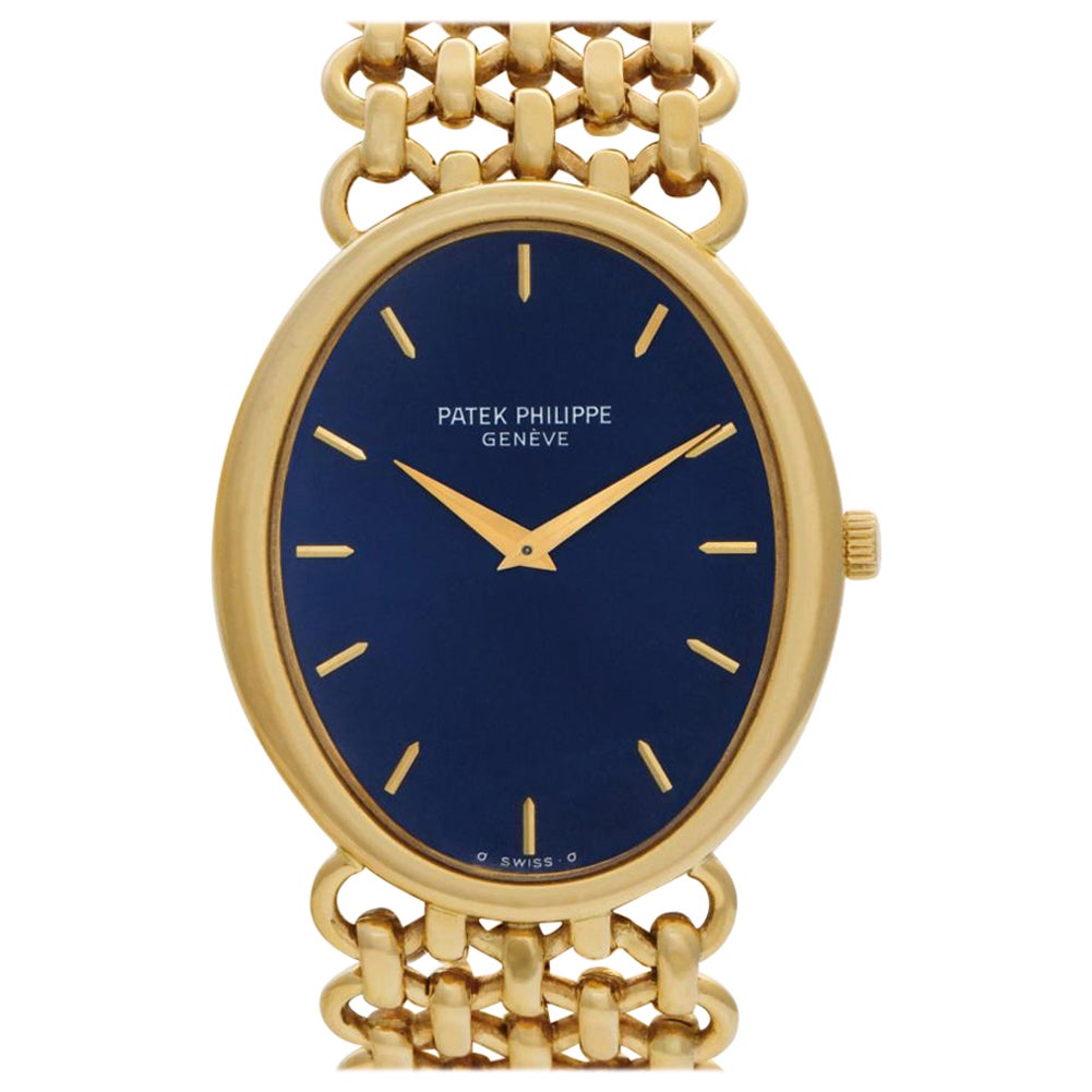 Patek Philippe 3857 18 Karat Yellow Gold Blue Dial Watch at 1stDibs