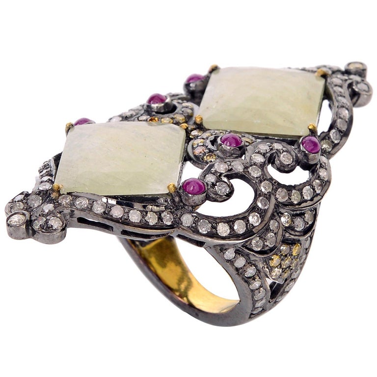 Long Ring with Ruby and Square Shaped Center Sapphires Surrounded by ...
