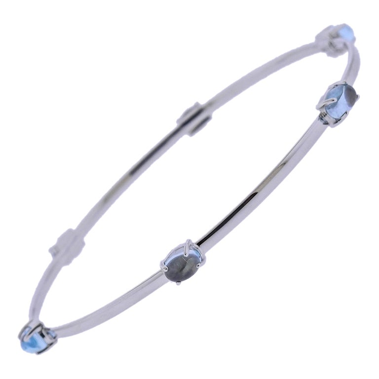 Bucherer Gold Blue Topaz Bangle Bracelet For Sale at 1stDibs