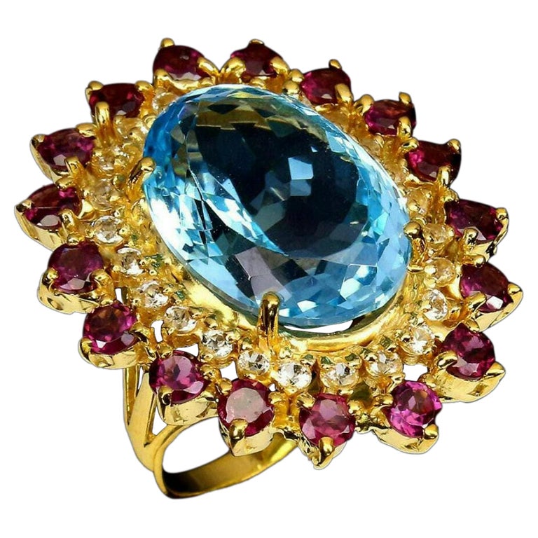 23.46 Carat Blue Topaz and Garnet Ring 14 Karat Yellow Gold For Sale at ...