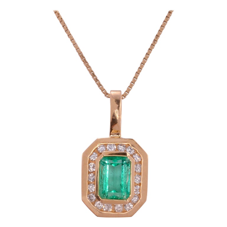Emerald Cut Emerald Pendant on Chain For Sale at 1stDibs