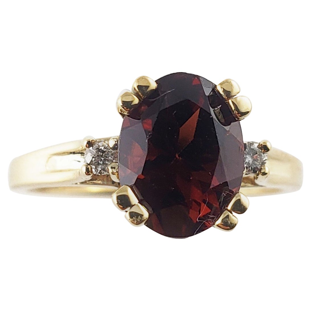 14 Karat Yellow Gold Garnet and Diamond Ring at 1stDibs