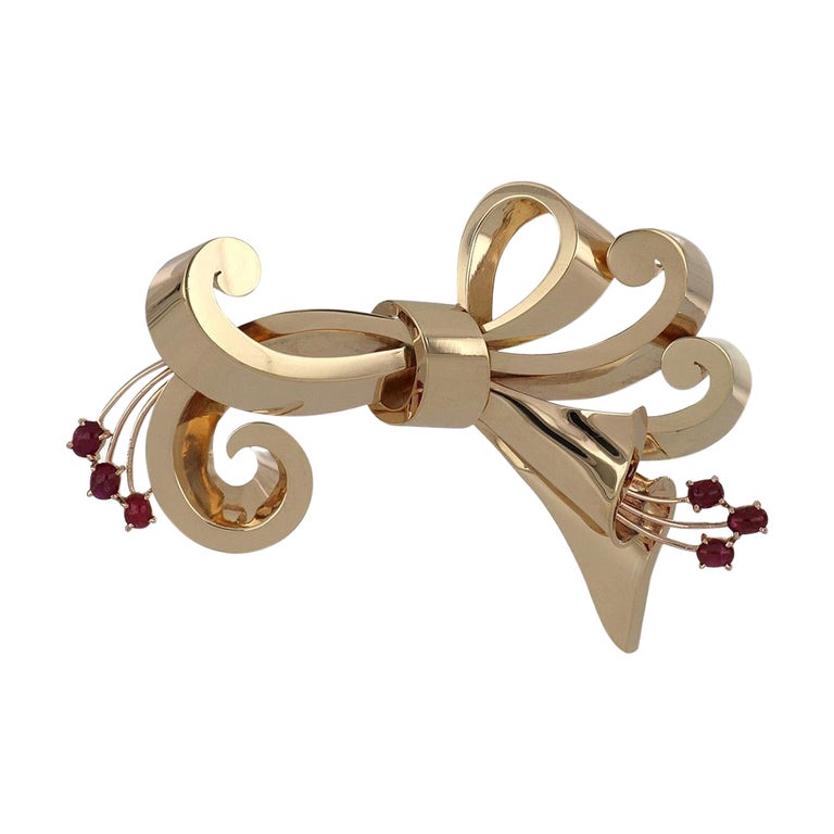 Retro 1940s 14K Gold Stylized Bow Pin with Rubies For Sale at 1stDibs