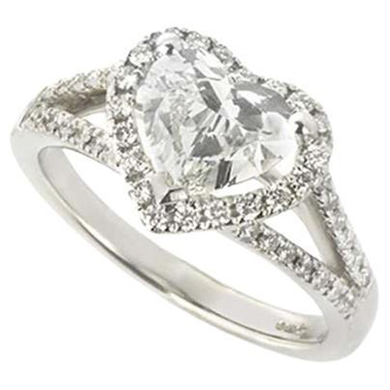 ReneSim Broad Elegant Ring with a Central Brilliant-Cut Diamond of 1 ...