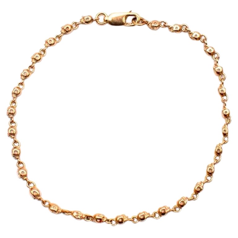 Garrard 18ct Yellow Gold Mini Skull Link Chain Bracelet For Sale at 1stDibs