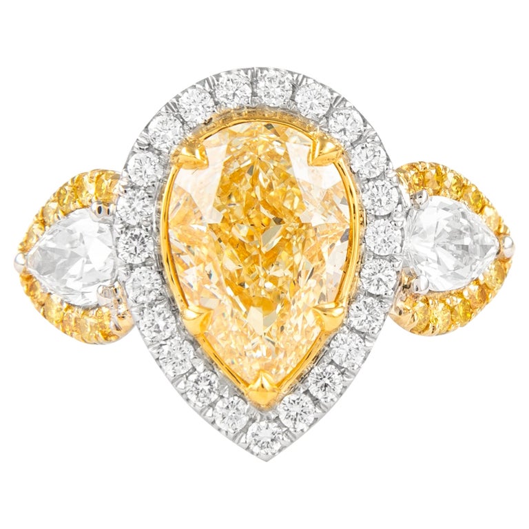 Alexander GIA Certified 3.09ct Fancy Yellow Diamond Three-Stone Halo Ring 18k For Sale at 1stDibs