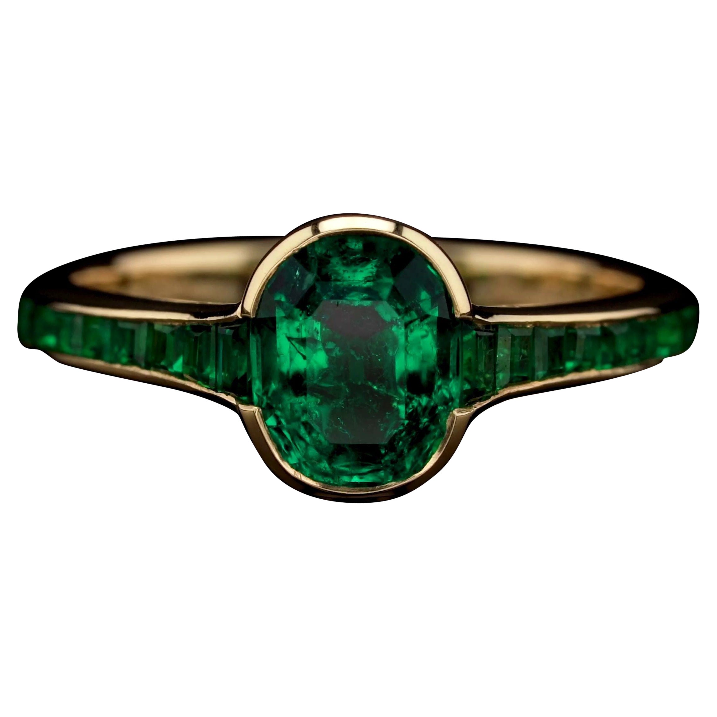 Hancocks 0.68ct Colombian Emerald Ring with Tapered Baguette Diamond ...