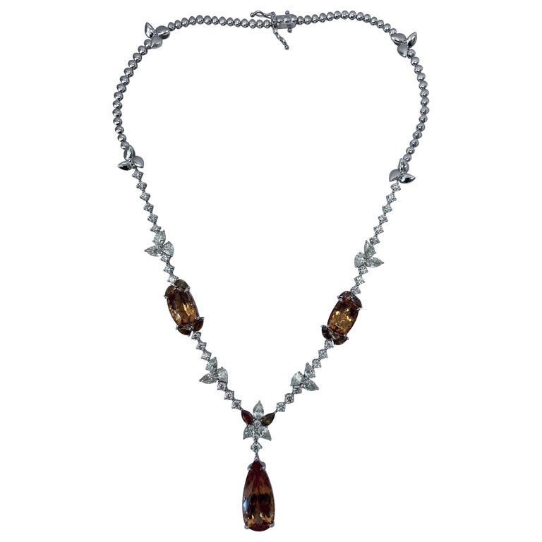 Natural Imperial Topaz 34.96 Carat with 12.59 Multi color Diamonds ...