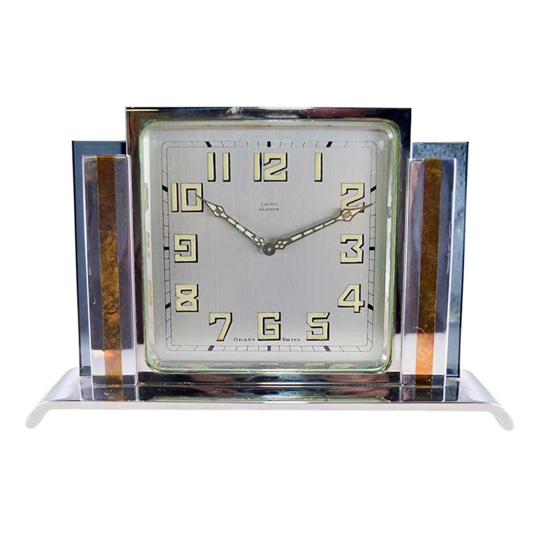 Gubelin Stone and Metal Art Deco Table Clock with Cherubic Hand Made Dial 1930's For Sale at 1stDibs
