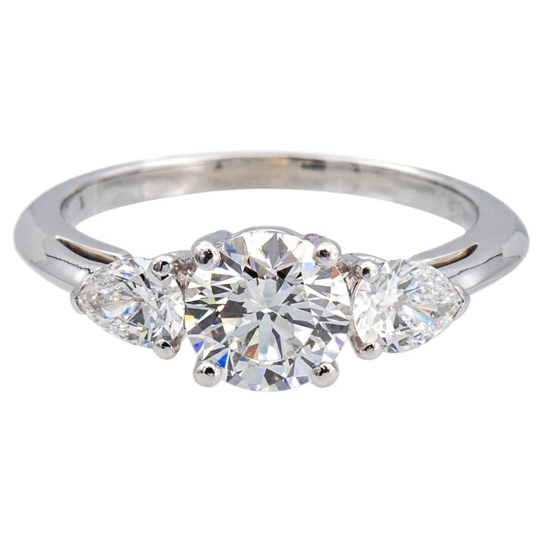 Tiffany and Co. Platinum Three-Stone Round Pear Shape Diamond Engagement Ring For Sale at 1stDibs