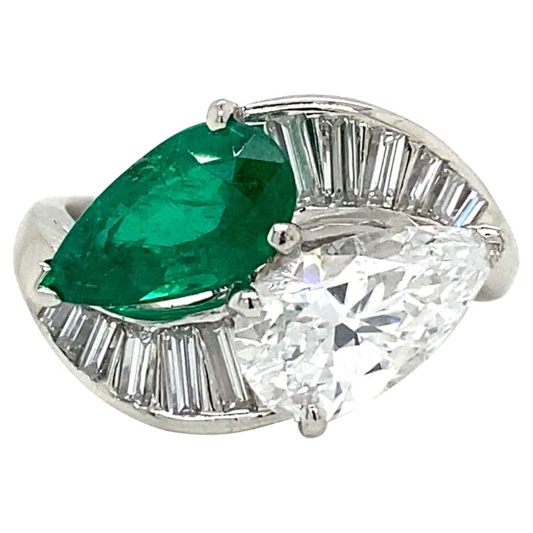 Platinum Emerald and Diamond Bypass Ring For Sale at 1stDibs