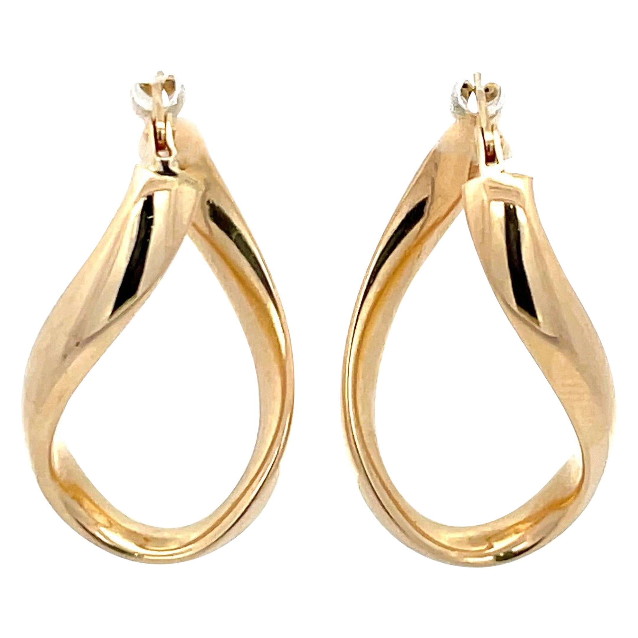 Tiny Huggie Hoop Earrings in 14 Karat Yellow Gold at 1stDibs