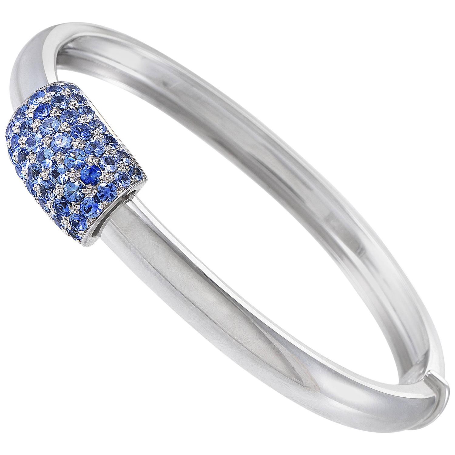 Piaget Blue Sapphire Gold Bangle Bracelet For Sale at 1stdibs