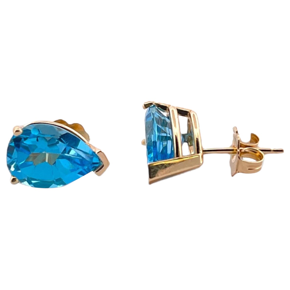 Vintage 1980's Heart-cut Blue Topaz Stud Earrings in 14K Yellow Gold For Sale at 1stDibs