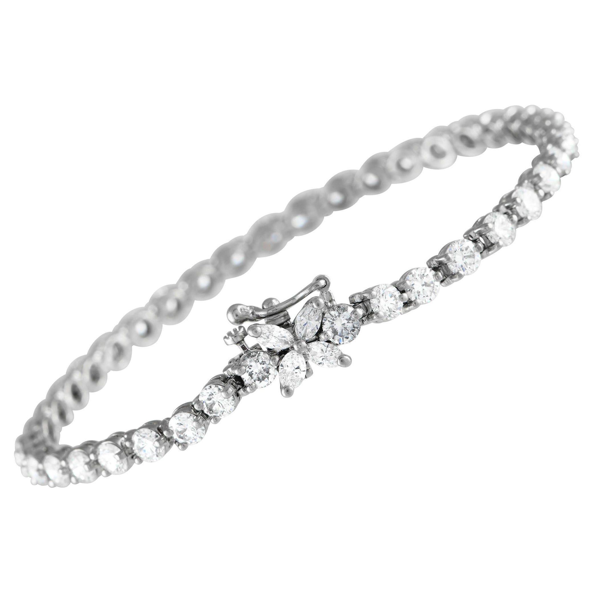 Tiffany And Co. Ruby, Diamond, Platinum And 18 Karat Gold Victoria