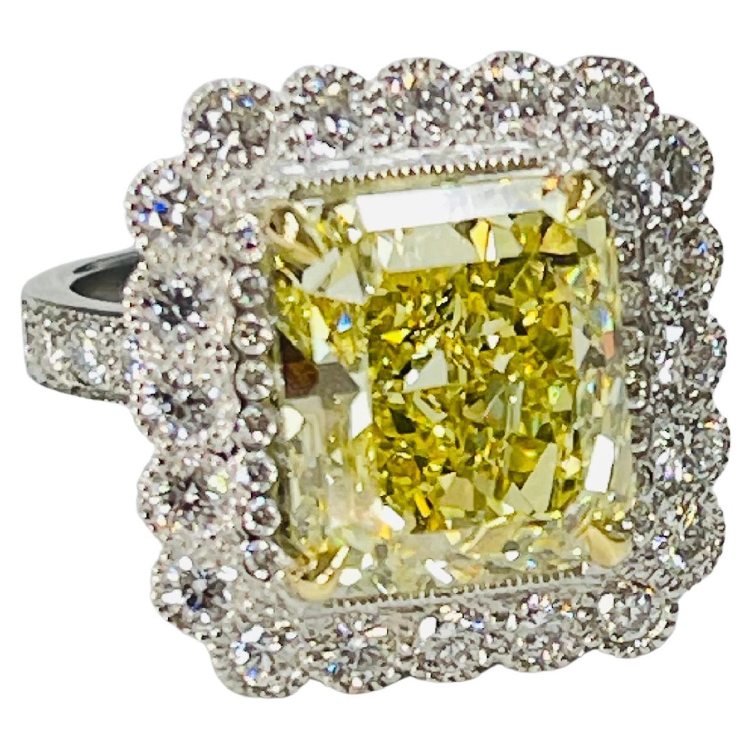 Fancy Intense Yellow Radiant Diamond And White Diamond Engagement Ring ...