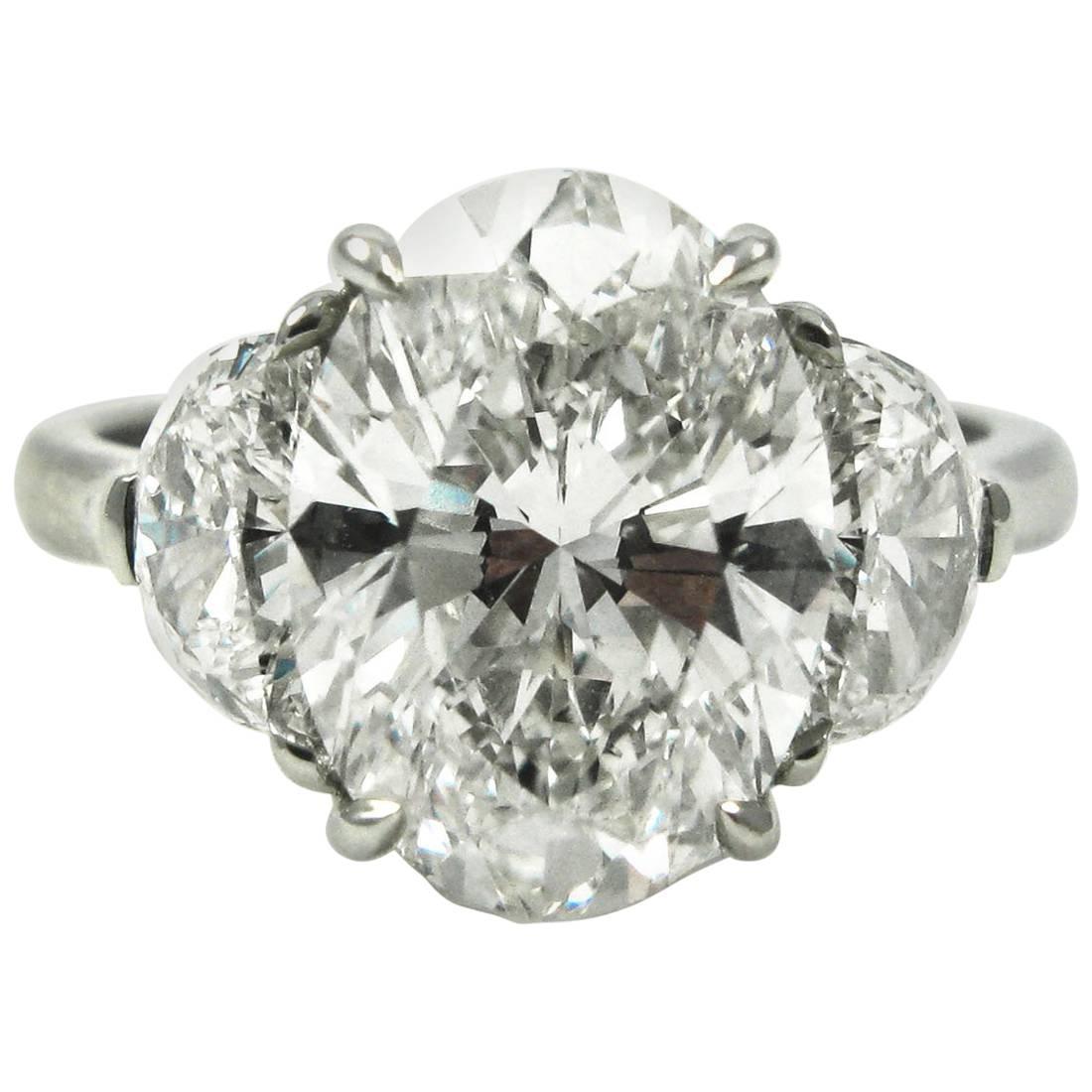 GIA Certified 4.03 Carat Oval Diamond and Half Moon Platinum Three ...