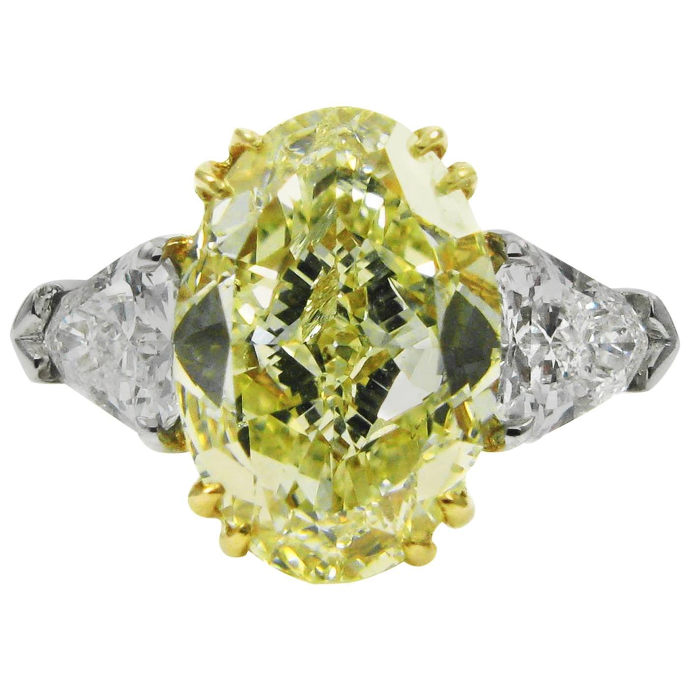 4.66 Carat GIA Certified Fancy Yellow Oval Diamond Platinum Ring at ...