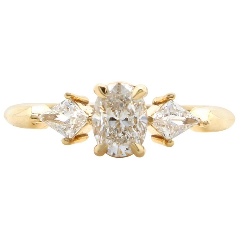 Gold Oval Kite Diamond Three-Stone Ring at 1stDibs