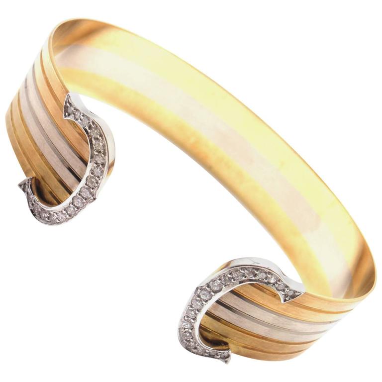 Cartier Double C Diamond Tri-Color Gold Cuff Bangle Bracelet at 1stDibs