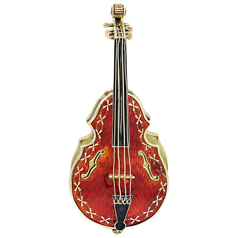 Yellow Gold Enamel Case Mechanical Cello Watch For Sale at 1stDibs