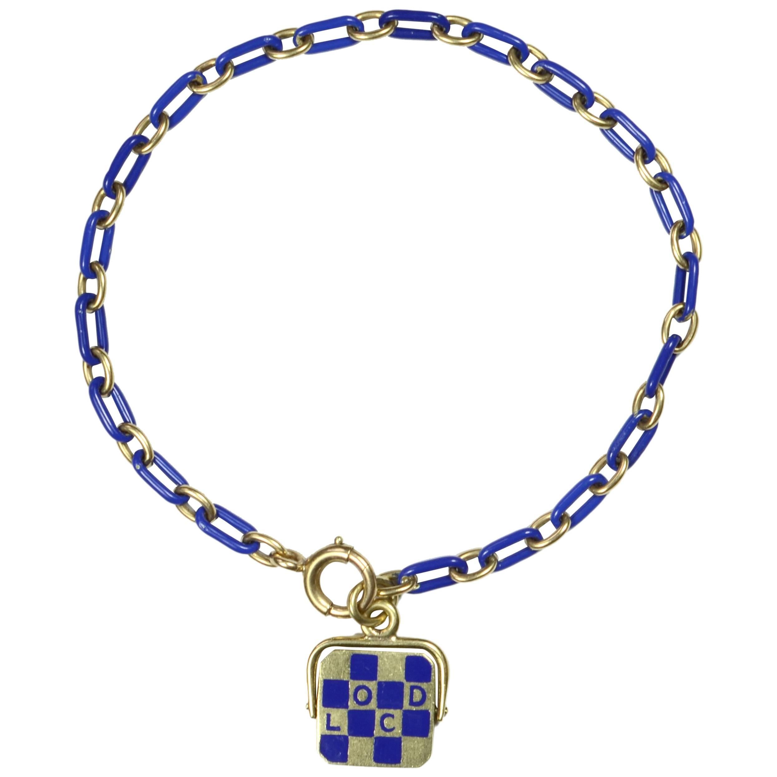 Art Deco Spinning Blue Enamel and Gold Good Luck Charm Bracelet, circa ...